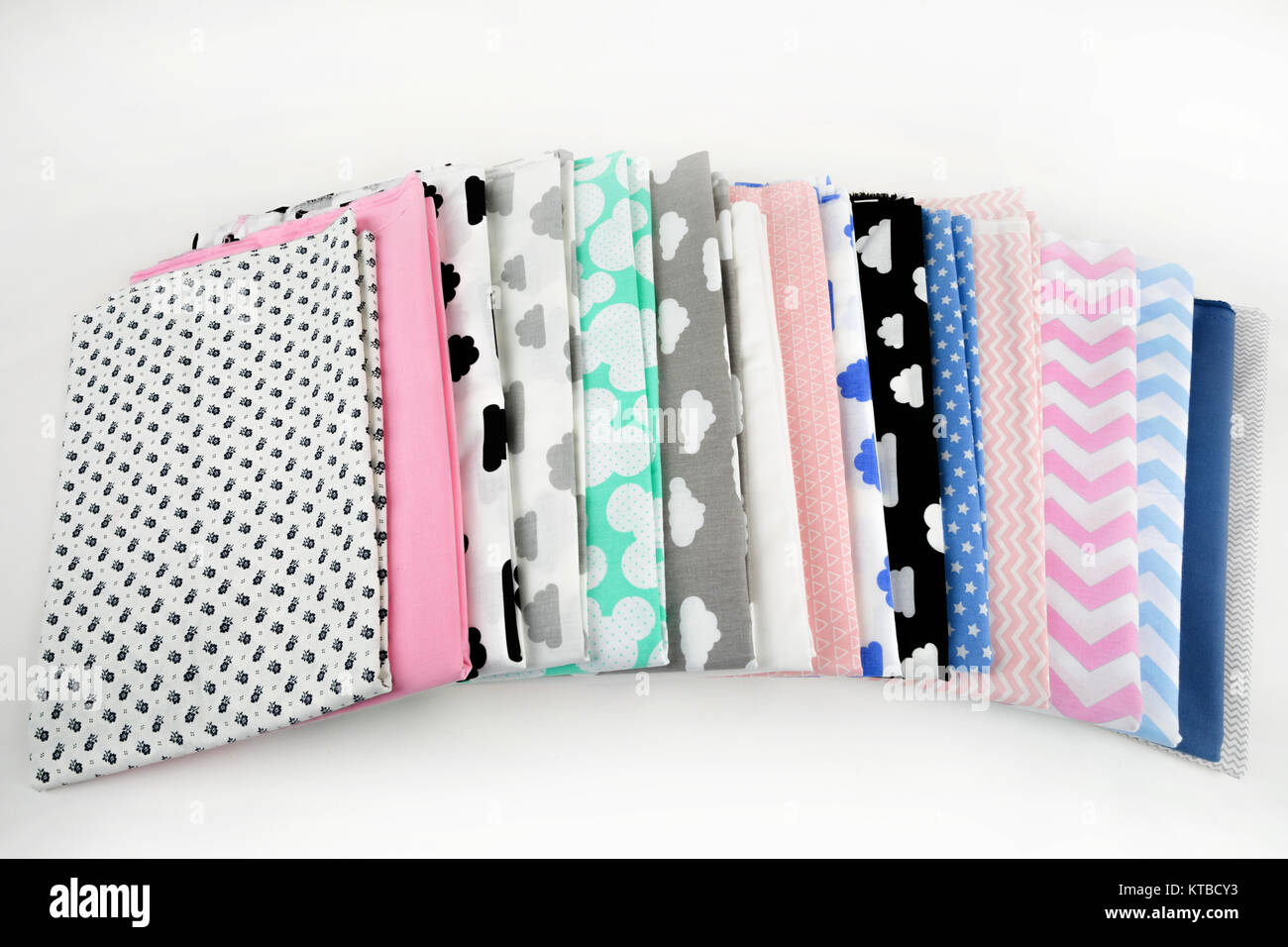 Stack of cotton fabric material Stock Photo - Alamy