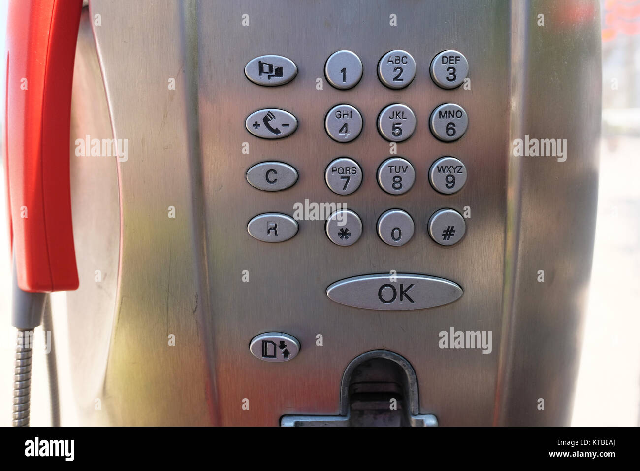 Metal public telephone Stock Photo - Alamy