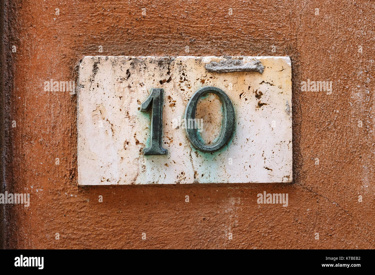 House number on wall Stock Photo - Alamy