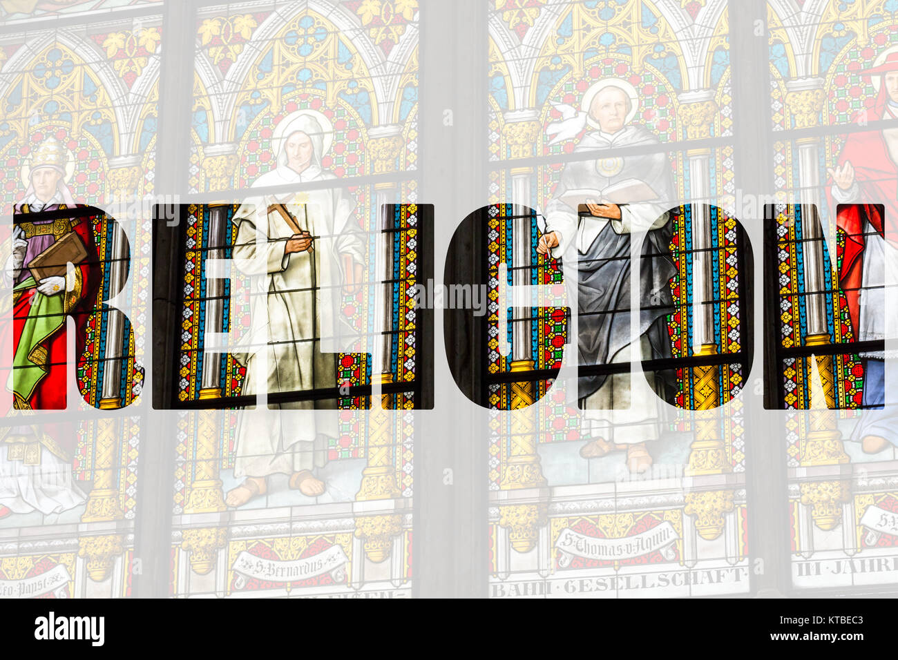 Word RELIGION over stained glass church window Stock Photo - Alamy