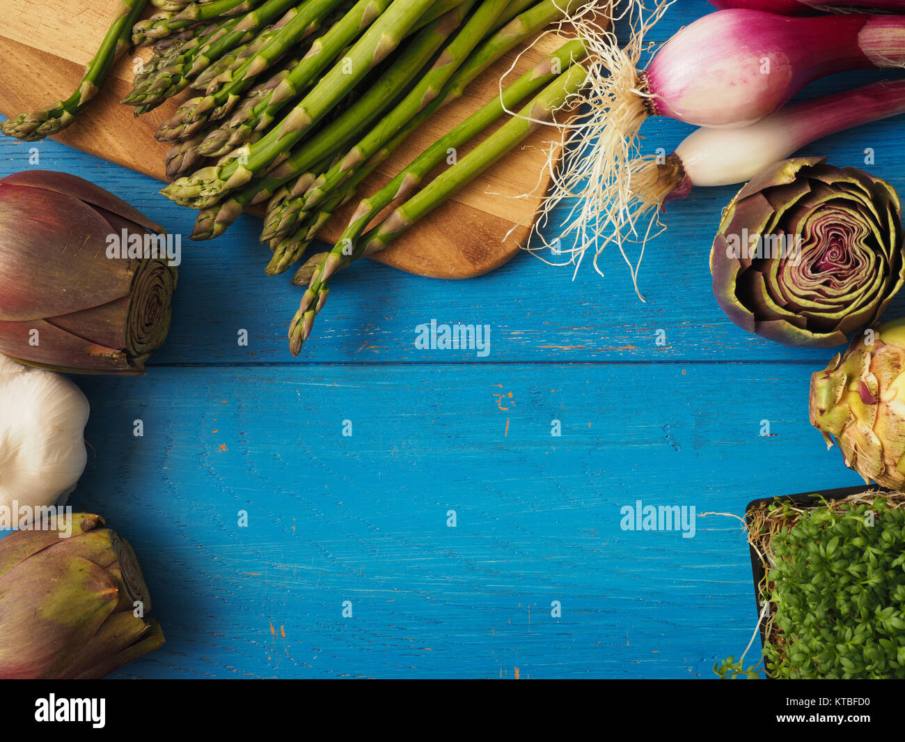 Healthy food concept with organic vegetables on a rustic wooden table ...