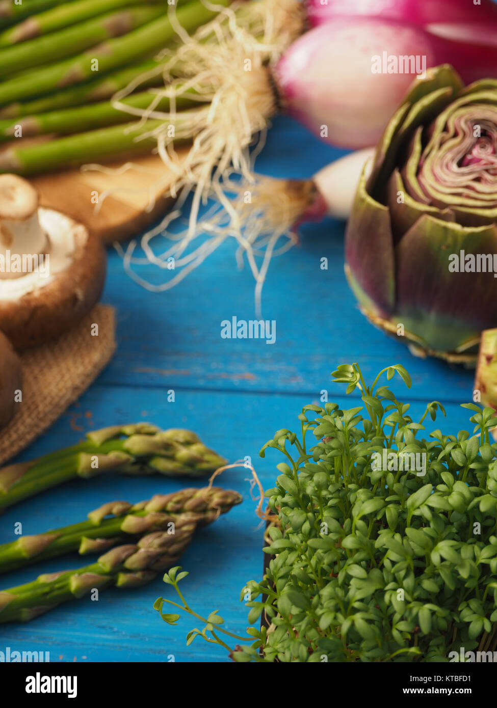 Healthy food concept with organic vegetables on a rustic wooden table ...