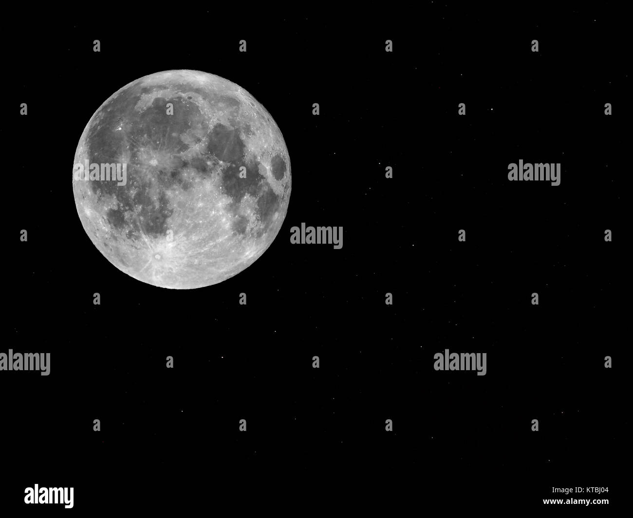 Full moon seen with telescope Stock Photo - Alamy