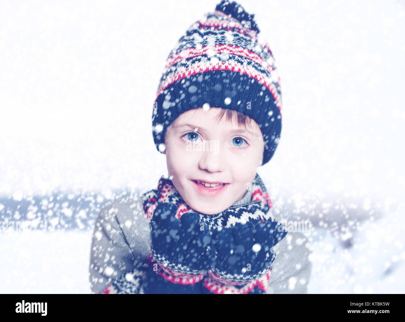 Winter Child Boy on Snow Background Stock Photo - Alamy