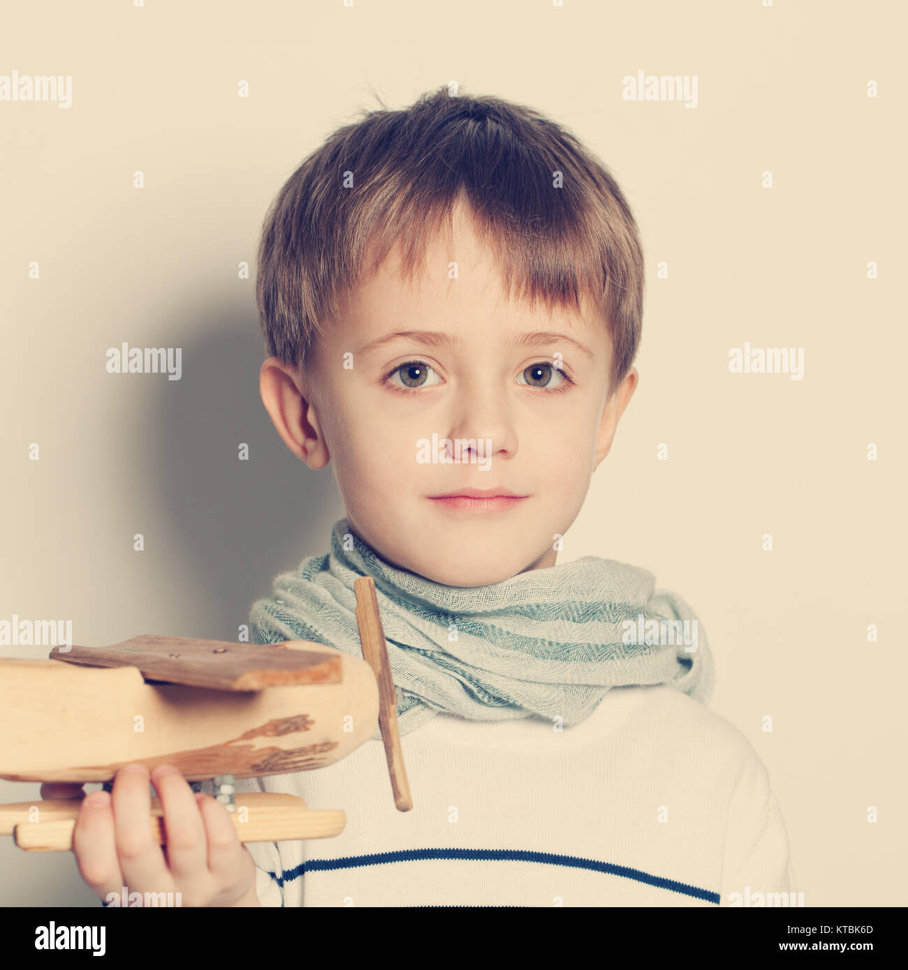 Cute child boy with toys, portrait Stock Photo - Alamy