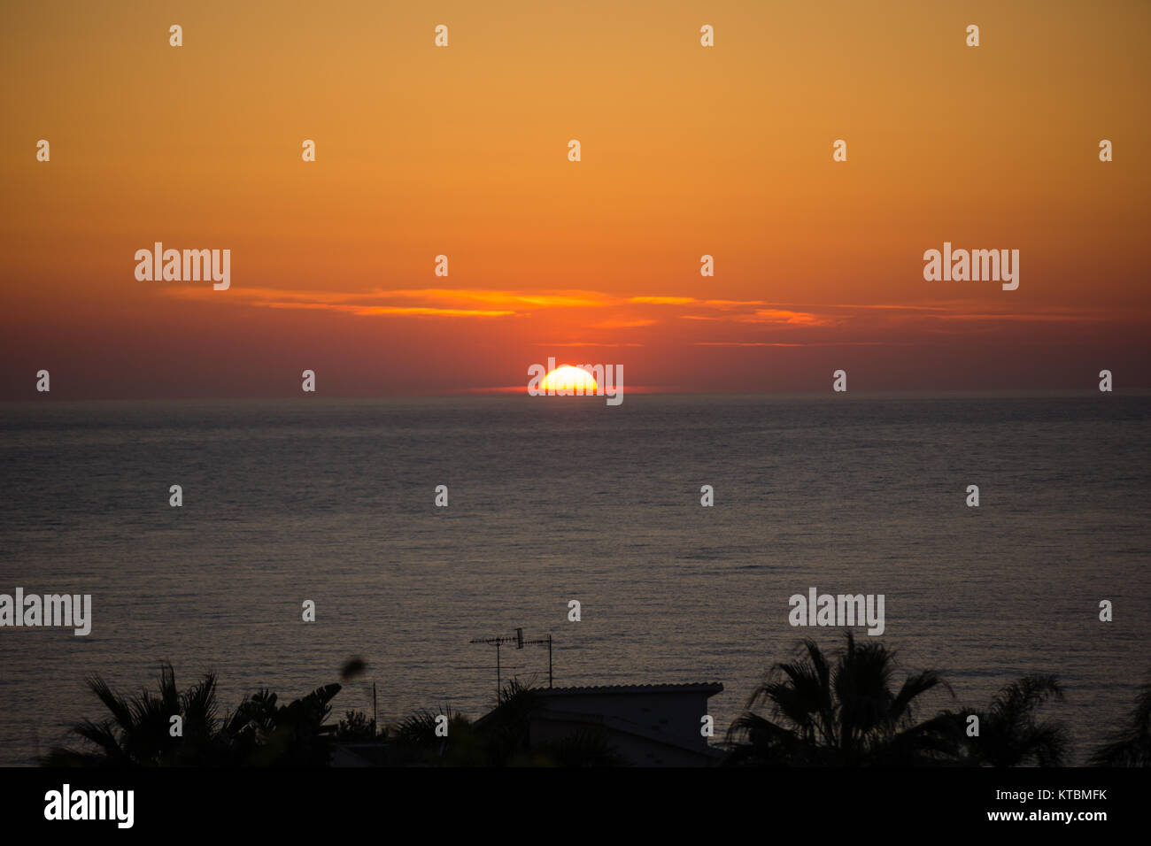 sunset over the sea Stock Photo - Alamy