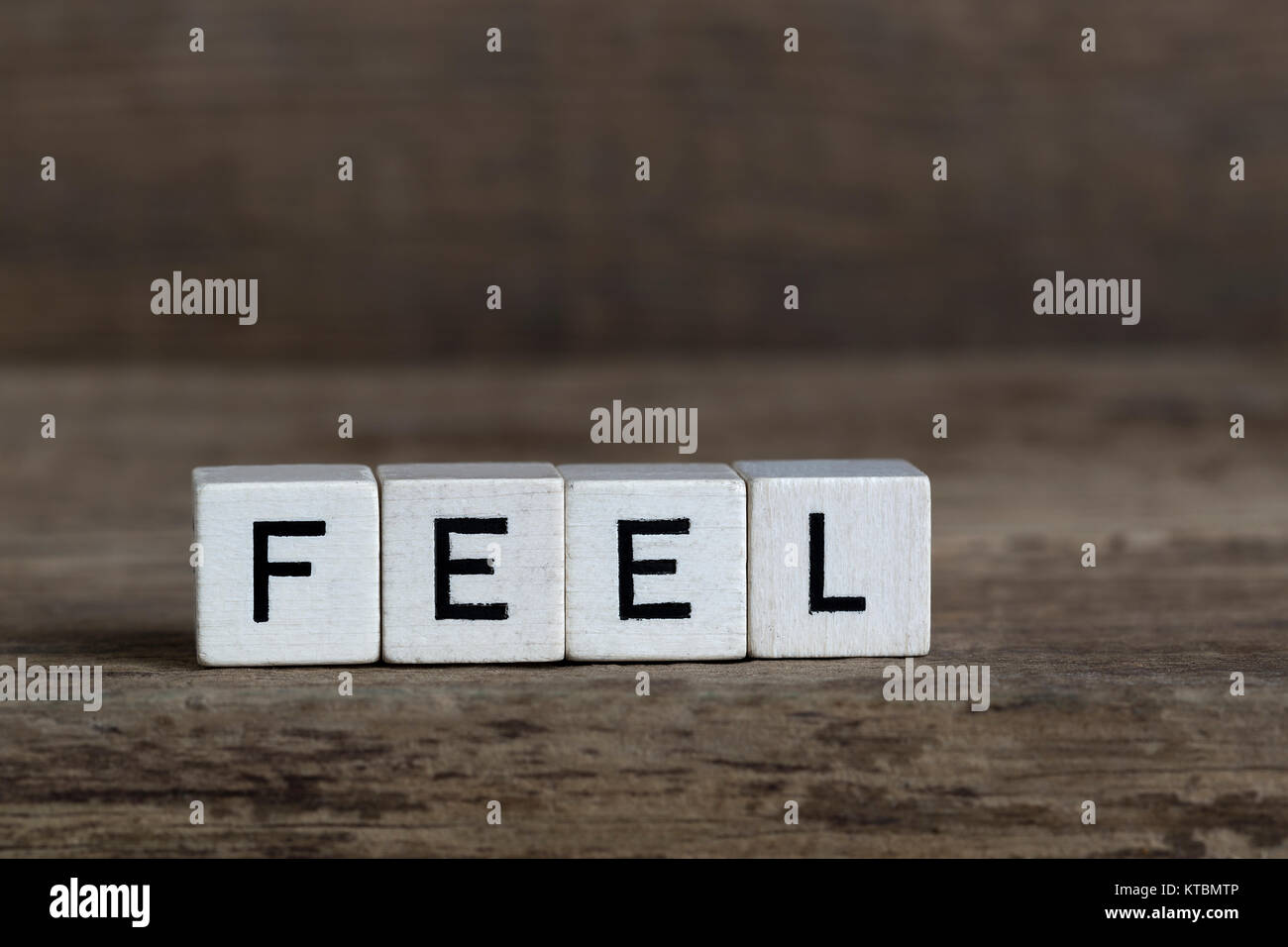 feel,written in cubes Stock Photo - Alamy