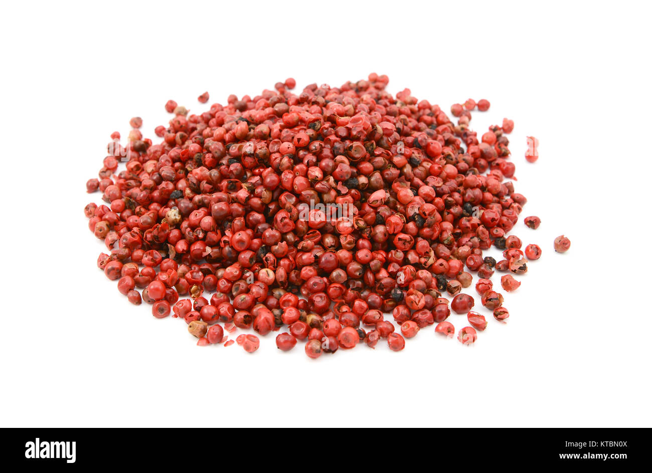 Dried pink peppercorns isolated Cut Out Stock Images & Pictures - Alamy