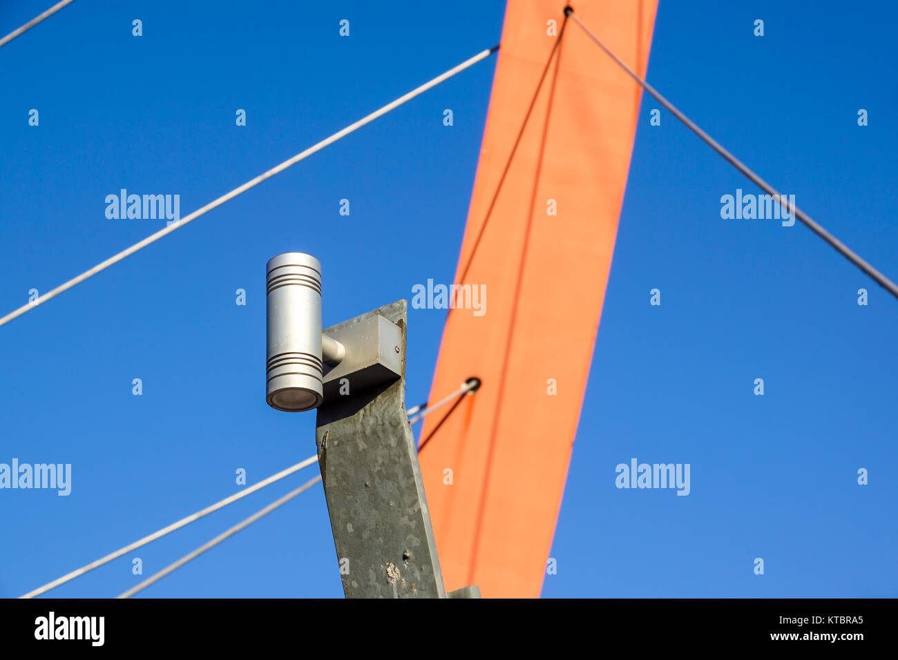 small LED spotlight on the metal bridge Stock Photo - Alamy