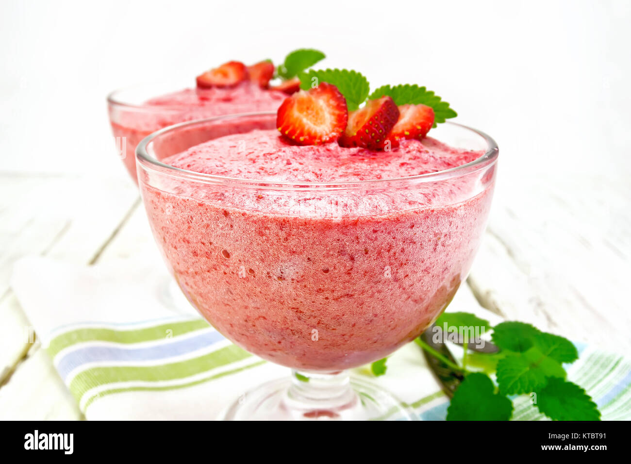 Jelly air strawberry in two bowls on board Stock Photo - Alamy