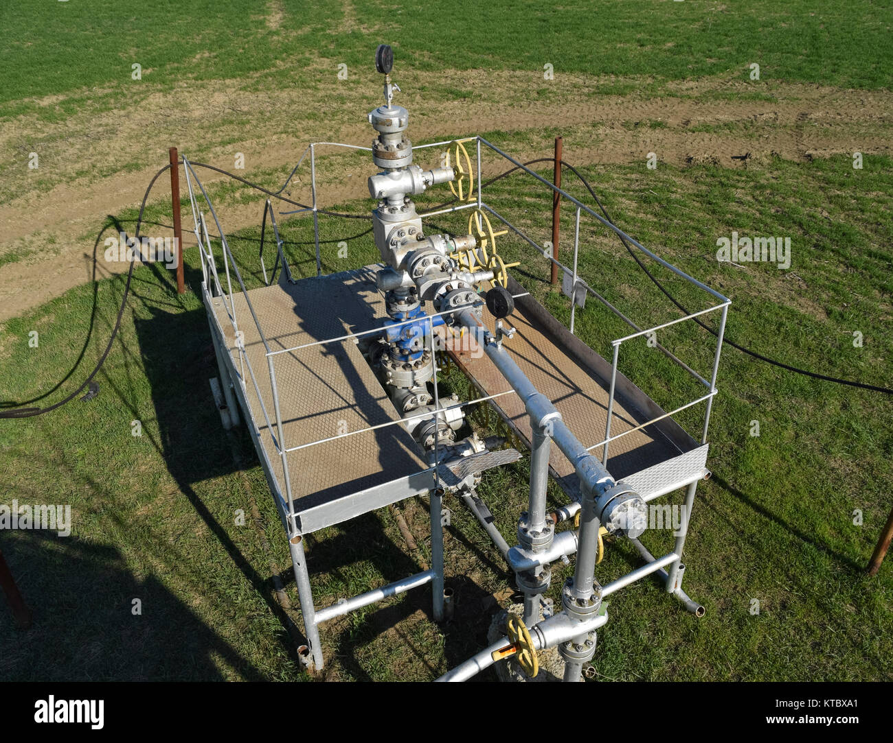 The equipment and technologies on oil fields. Oil well Stock Photo - Alamy