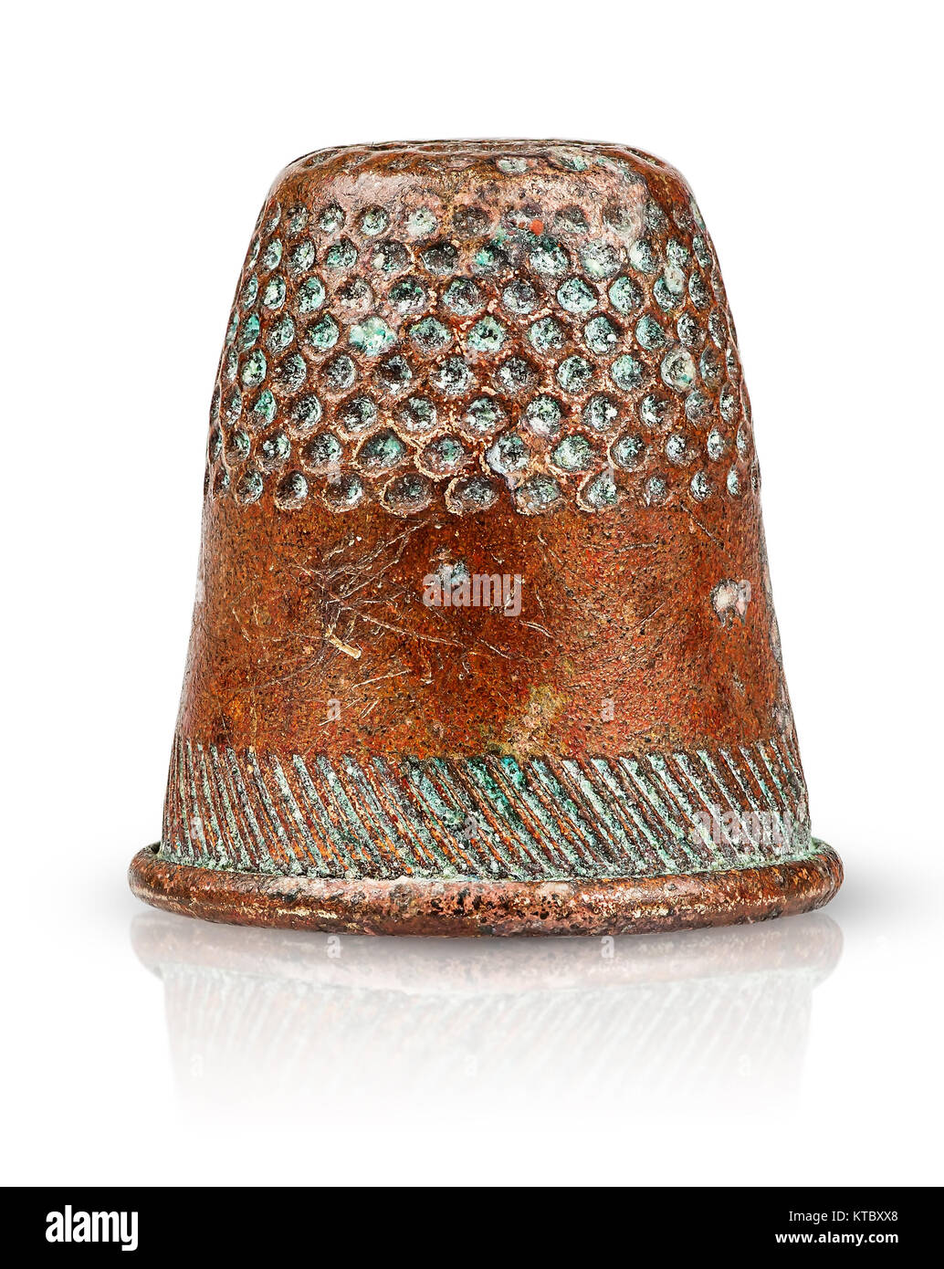 Old antique copper thimble Stock Photo - Alamy