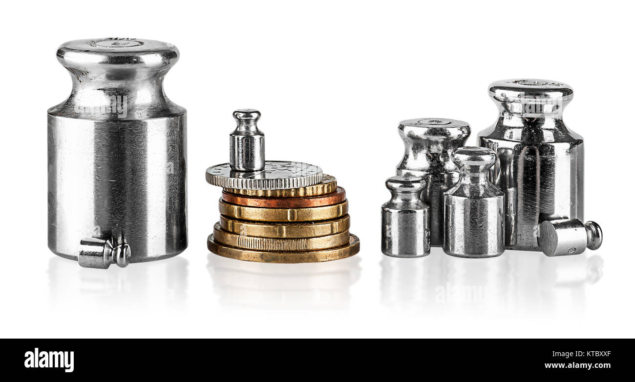 Several old scaling weights and coins Stock Photo - Alamy