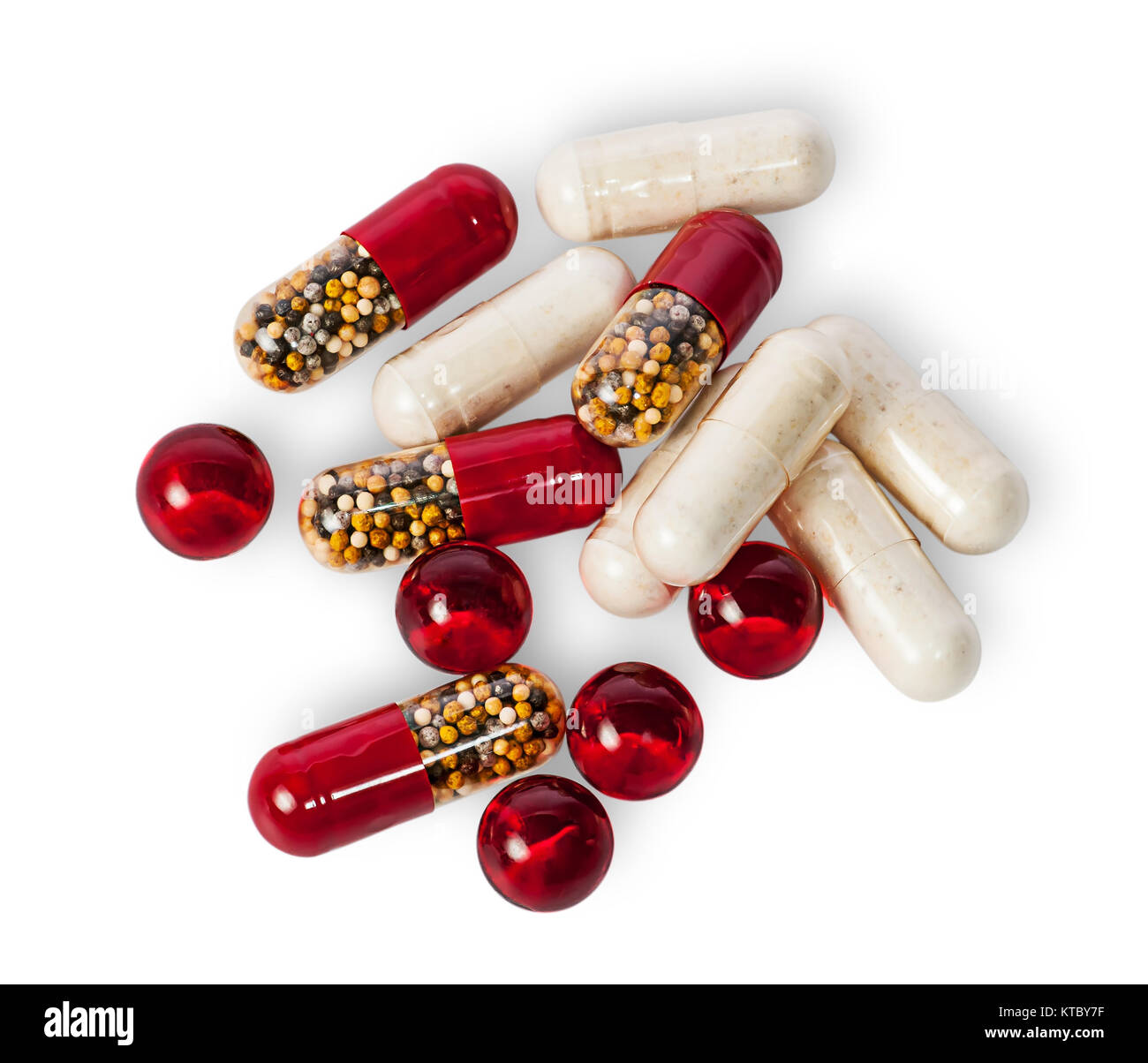 Scattered pills and capsules different color Stock Photo - Alamy