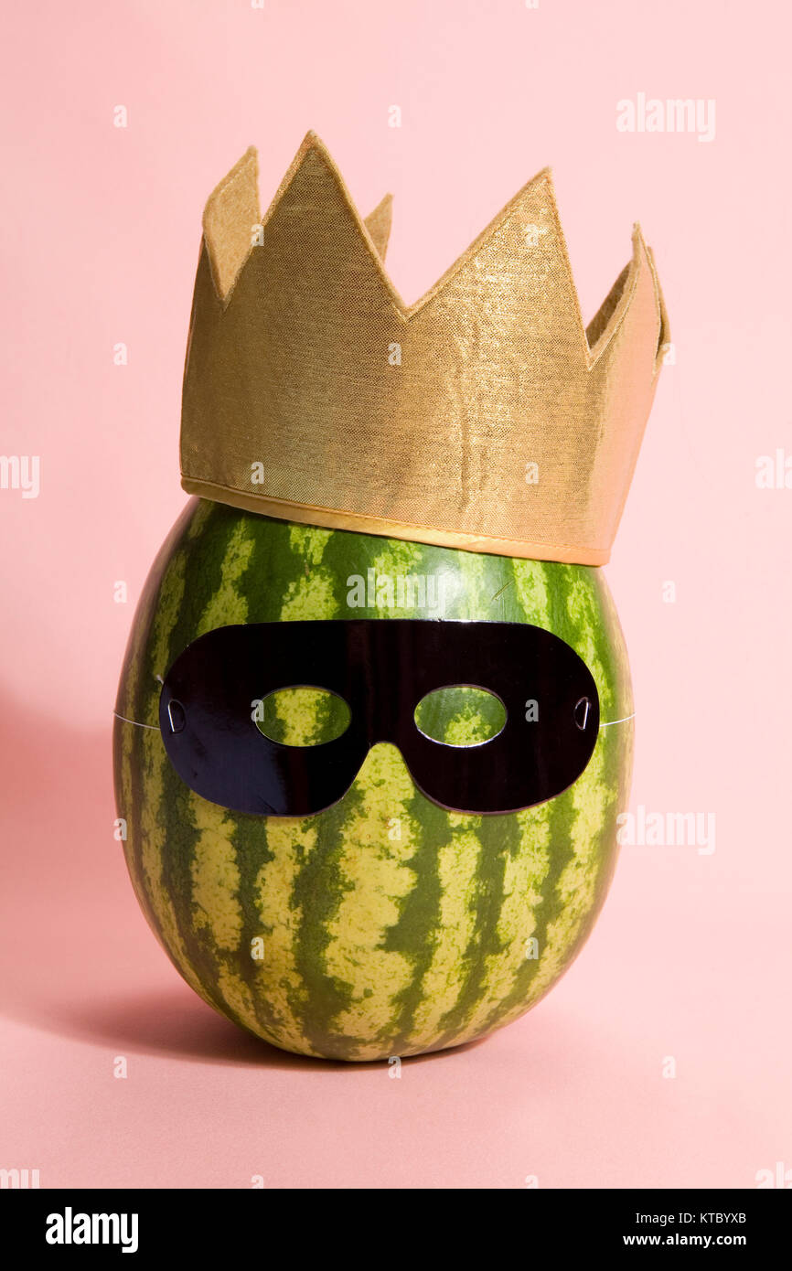Superwatermelon wearing a black mask Stock Photo - Alamy