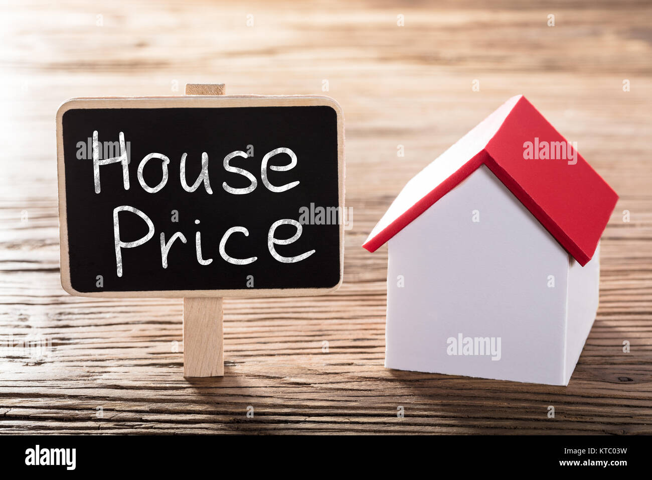 Text House Price Written On Blackboard With A House Model Stock Photo ...