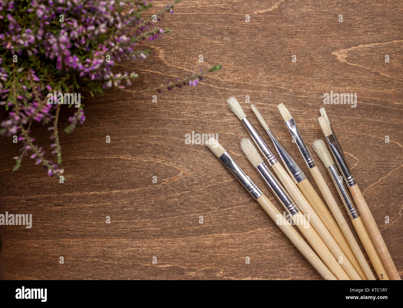 brushers on brown wooden background Stock Photo - Alamy