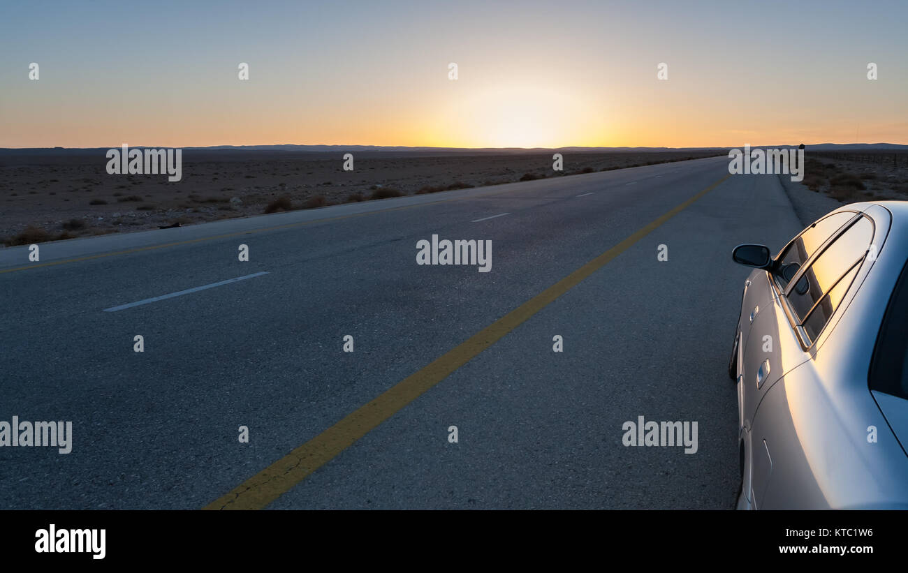 sundown and Desert Highway (Road 15) in Jordan Stock Photo - Alamy