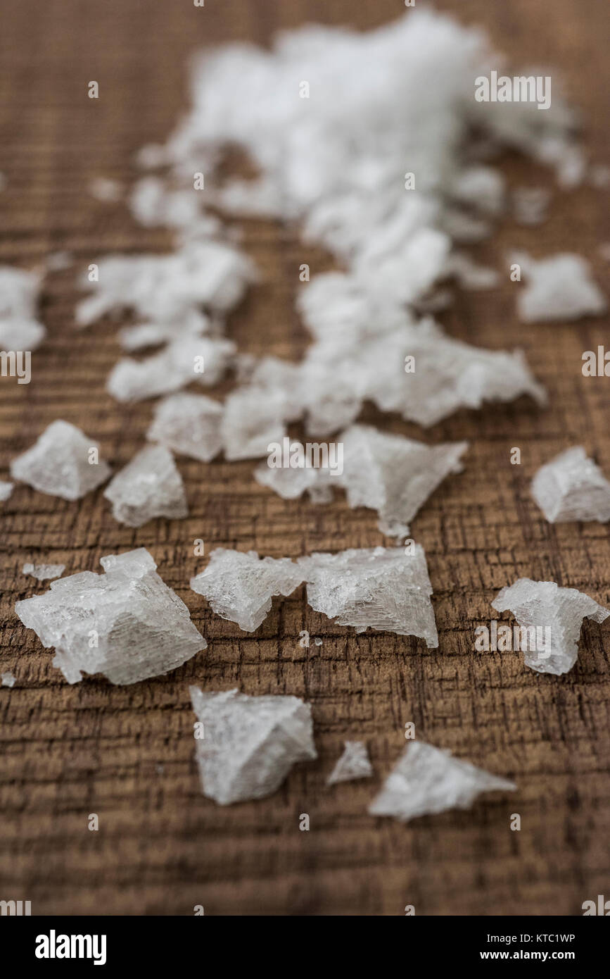 Salt crystals on a board Stock Photo - Alamy