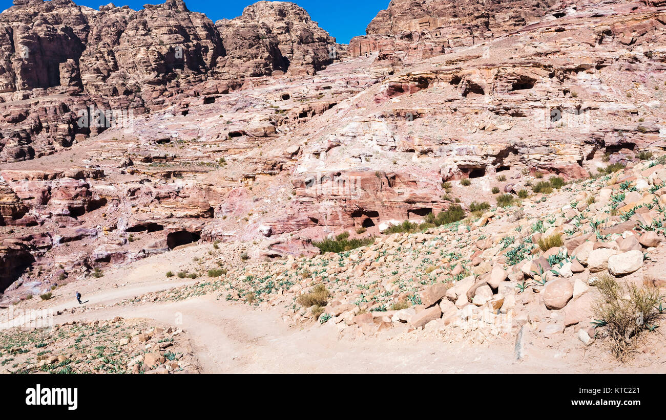path along ancient caves in Petra town Stock Photo - Alamy