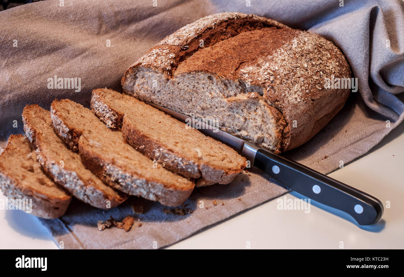 fresh bread cut by knife Stock Photo - Alamy