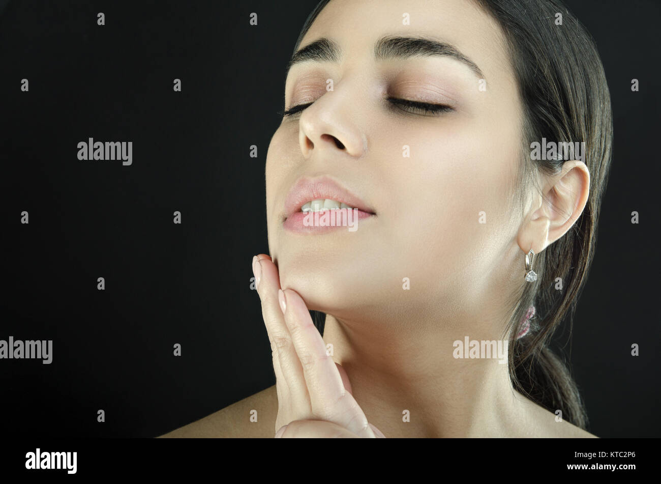 Portrait of a woman who is praying Stock Photo - Alamy