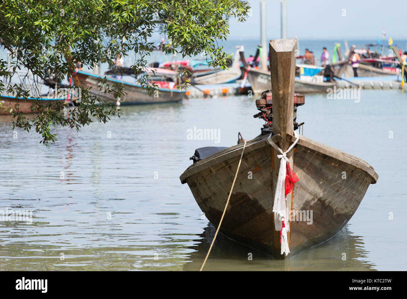 Long boat and tropical beach Stock Photo - Alamy