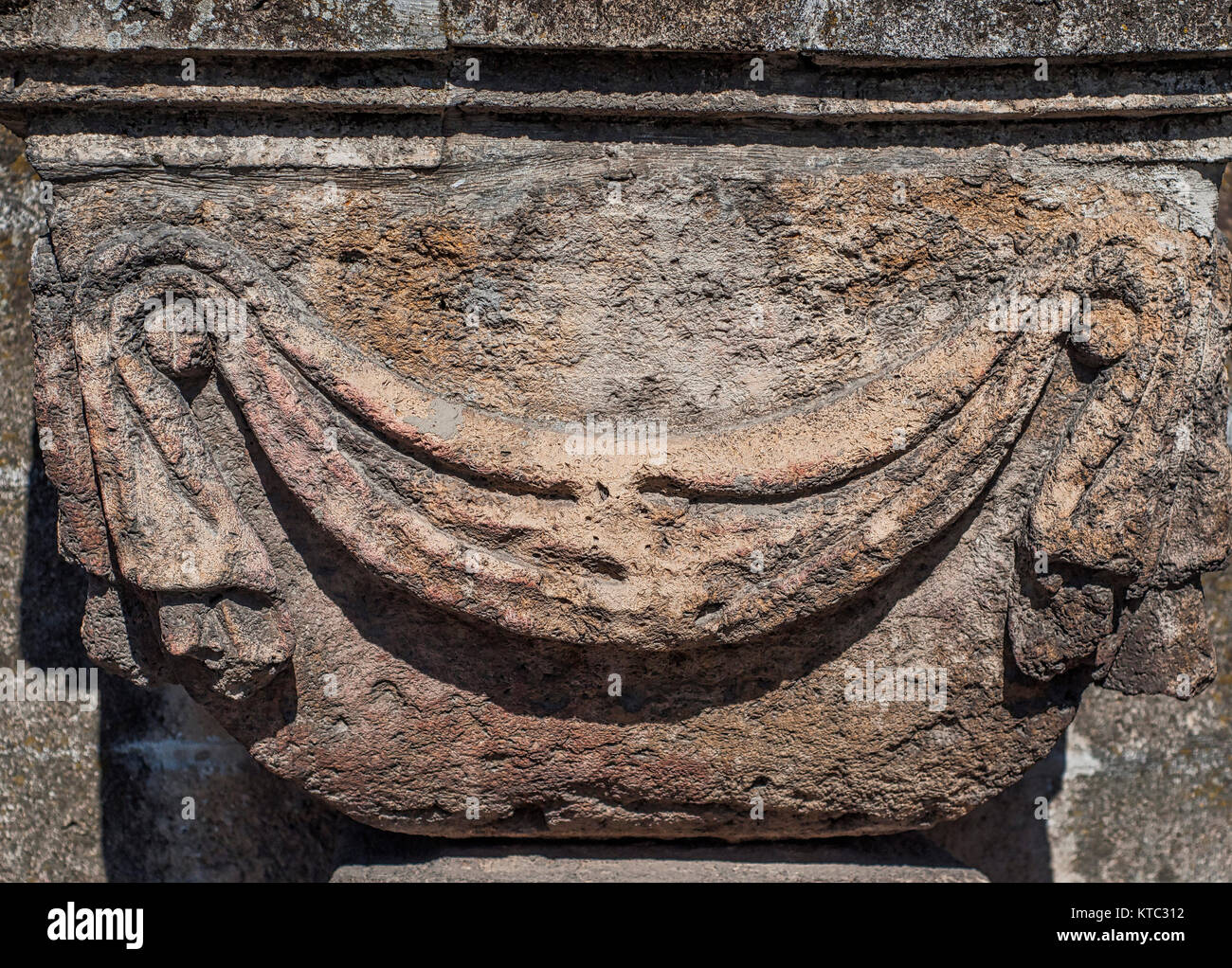 Fragment of an ancient stone pedestal Stock Photo - Alamy