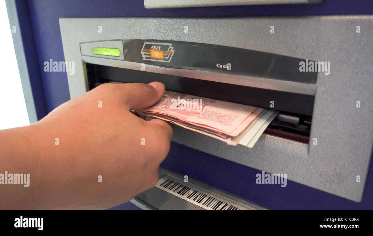Dollar bill in atm hi-res stock photography and images - Alamy
