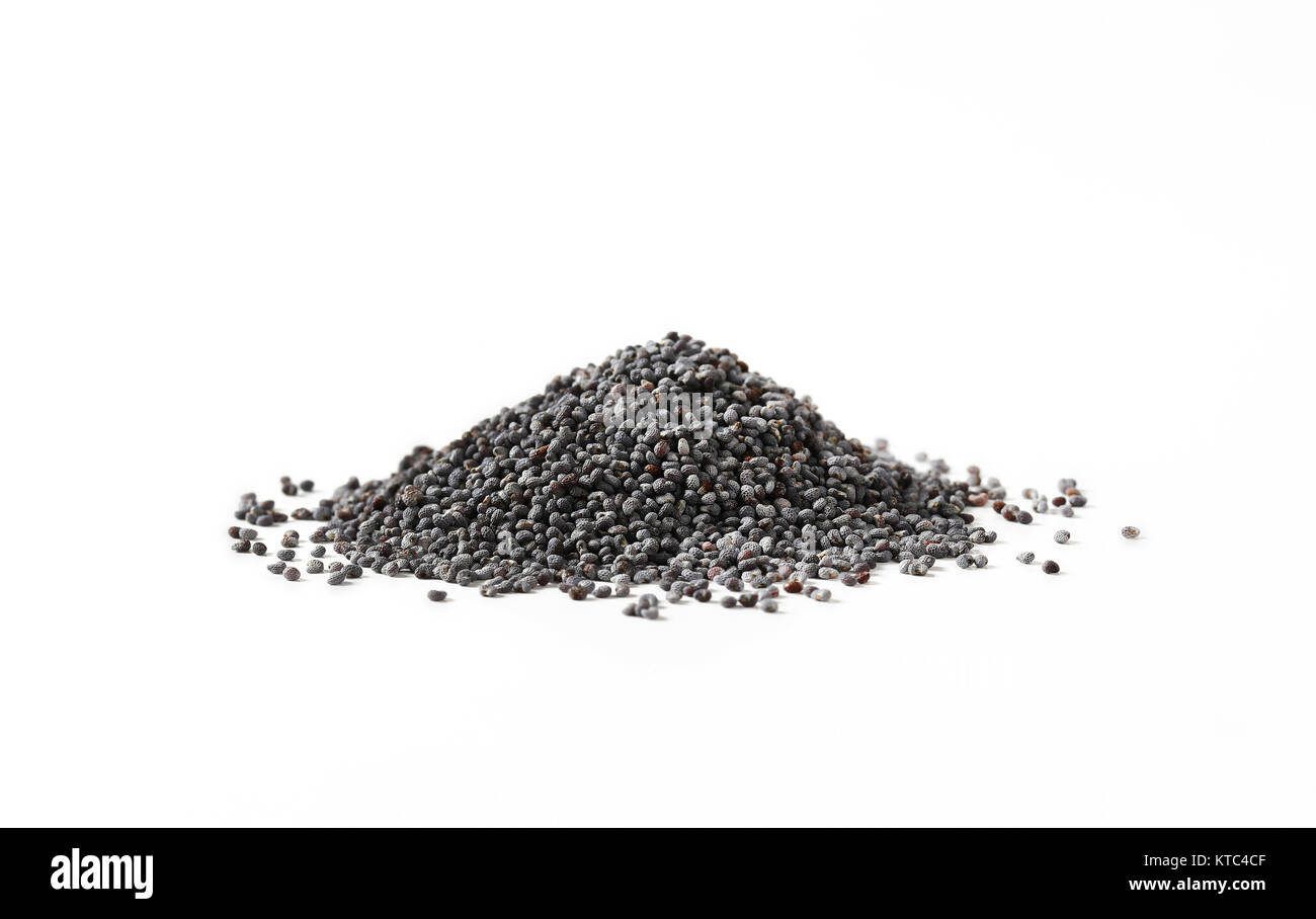 Whole black poppy seeds Stock Photo - Alamy