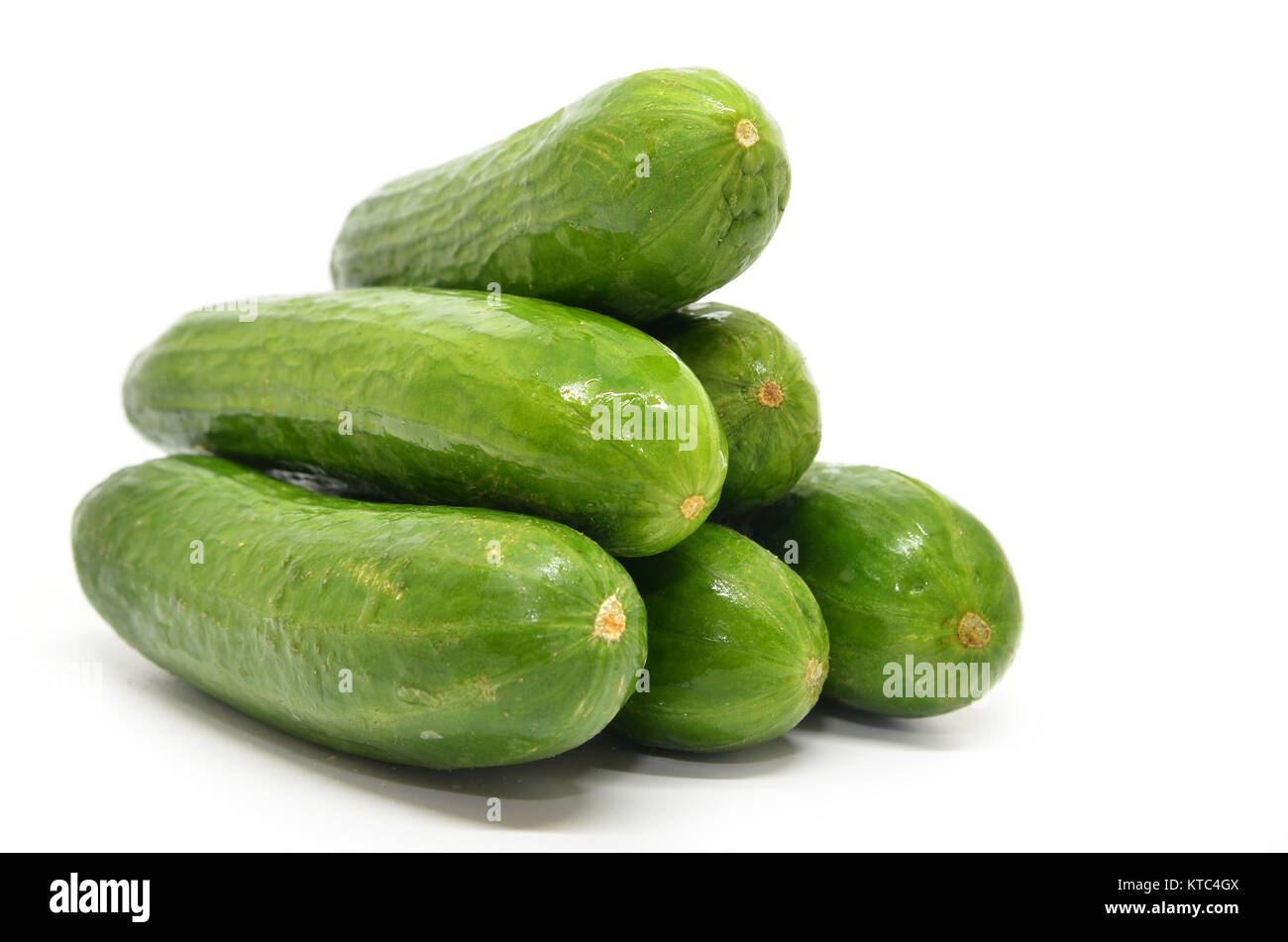 Fresh cucumbers isolated Stock Photo - Alamy