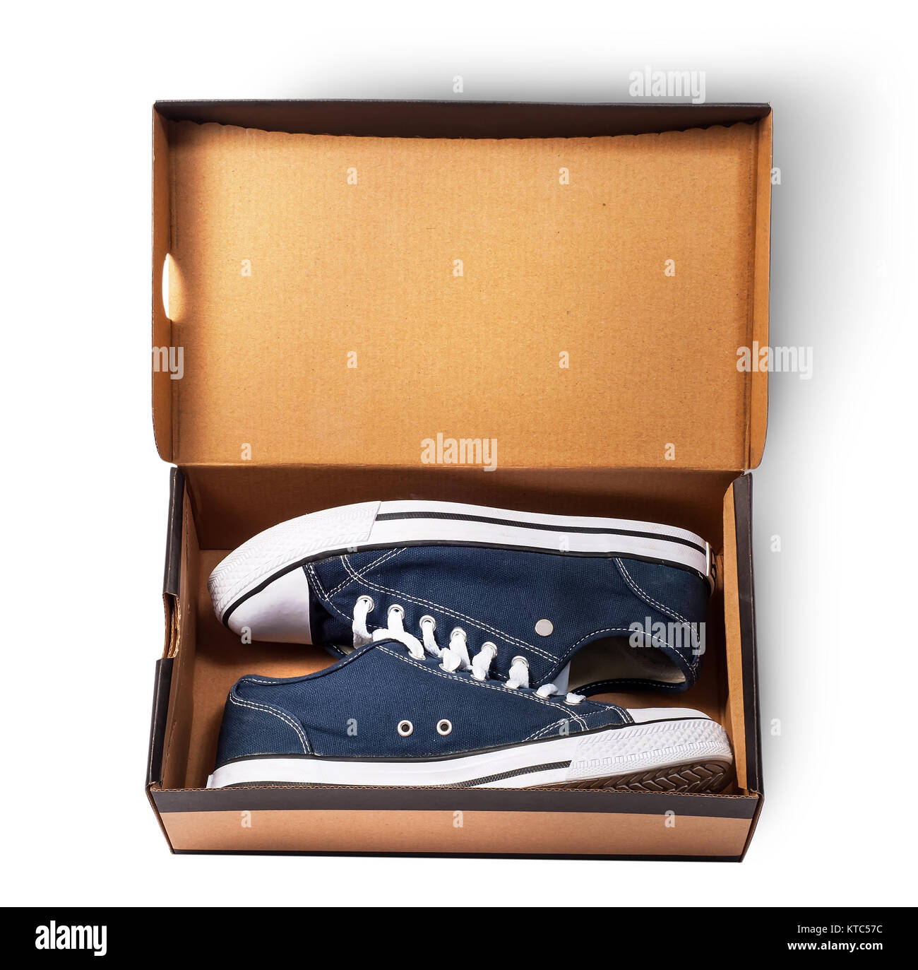 Dark blue sports shoes inside cardboard box Stock Photo - Alamy