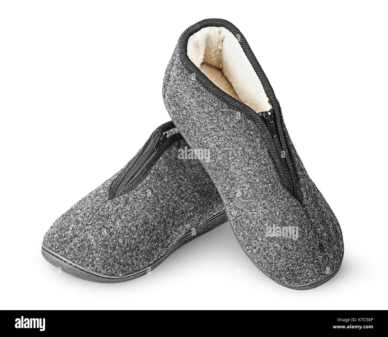 Dark gray slippers with fur one on another Stock Photo - Alamy
