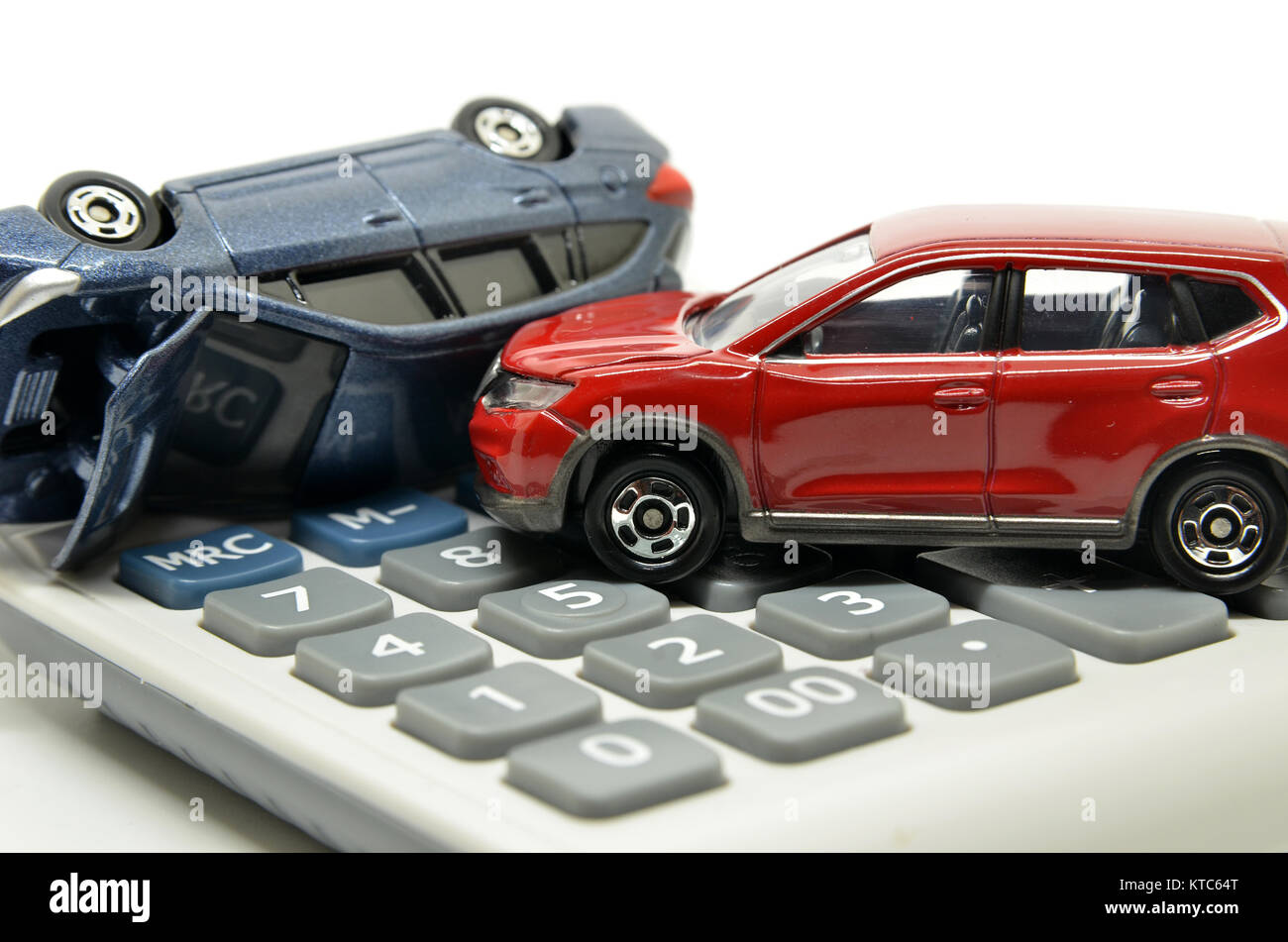 Car insurance concept with calculator Stock Photo - Alamy