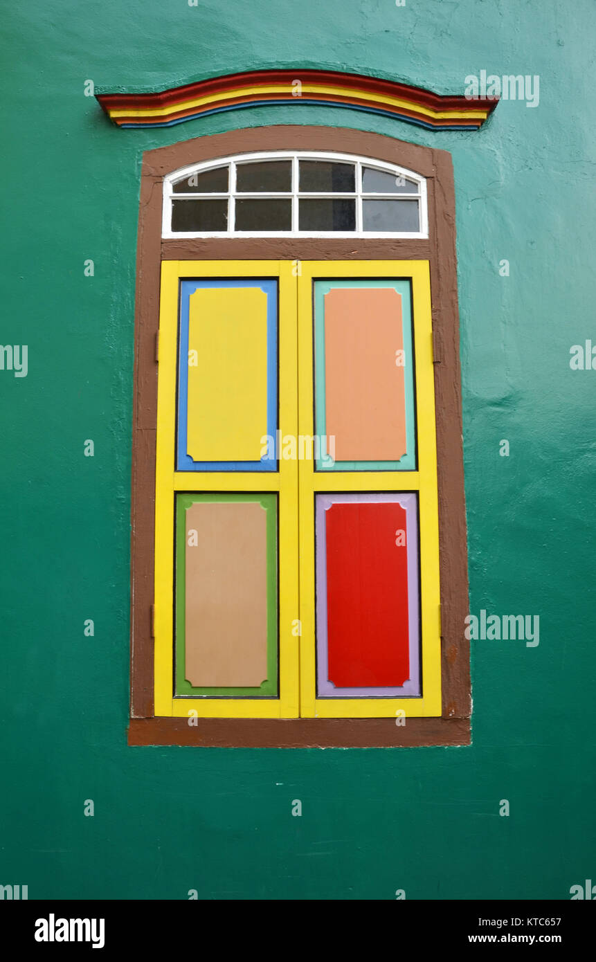 Colorful window a colonial house Stock Photo - Alamy