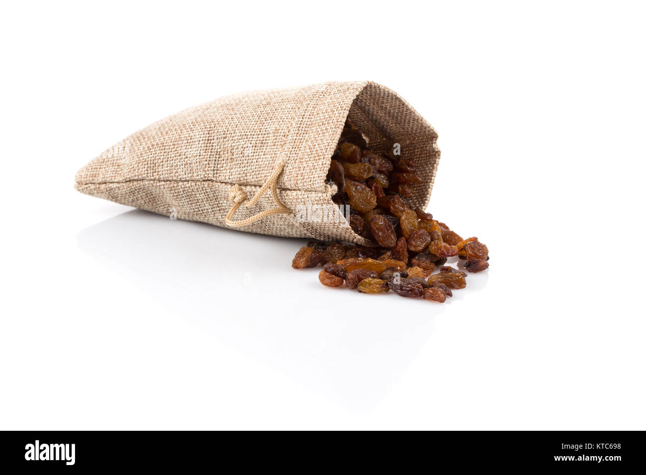 Sweet raisins on white Stock Photo - Alamy