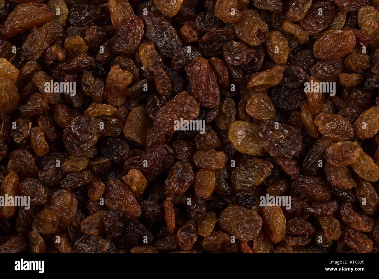 Sweet raisins background Stock Photo - Alamy