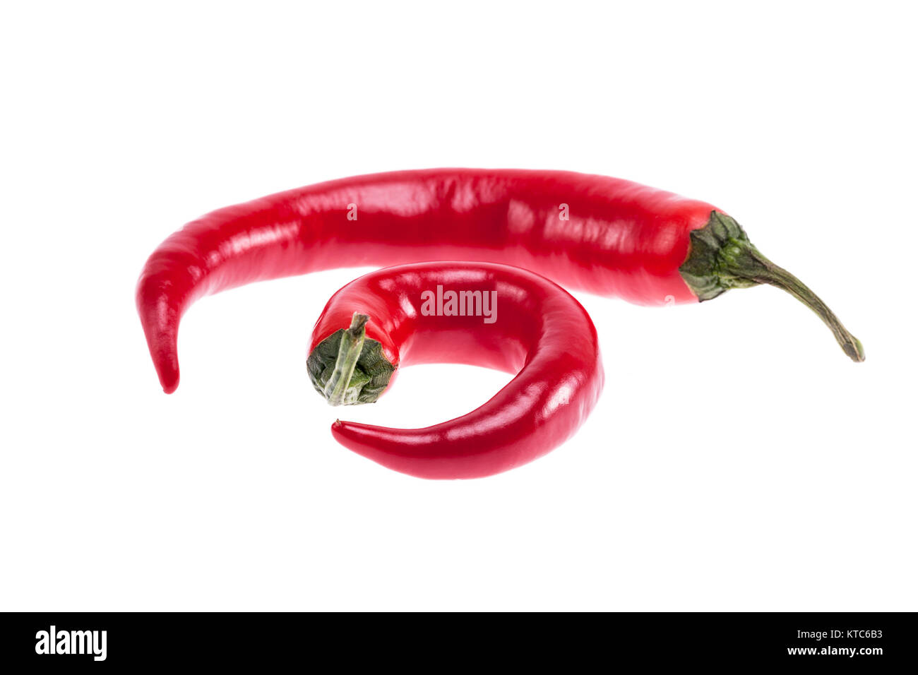 Red peperoni peppers isolated on white background Stock Photo - Alamy