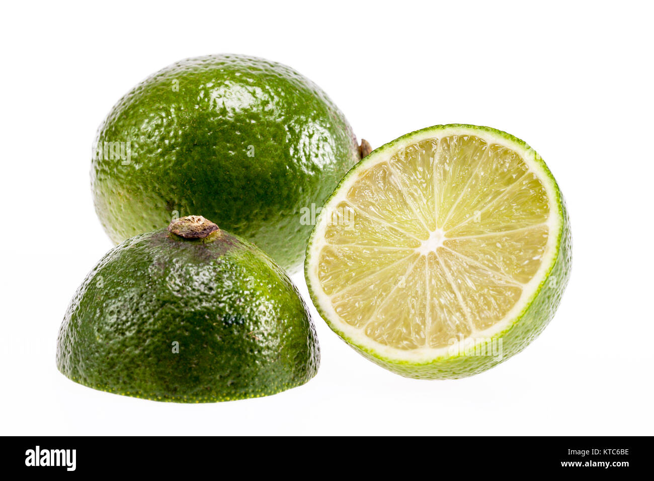 Pieces of fresh green fruit of lime isolated on white background Stock ...