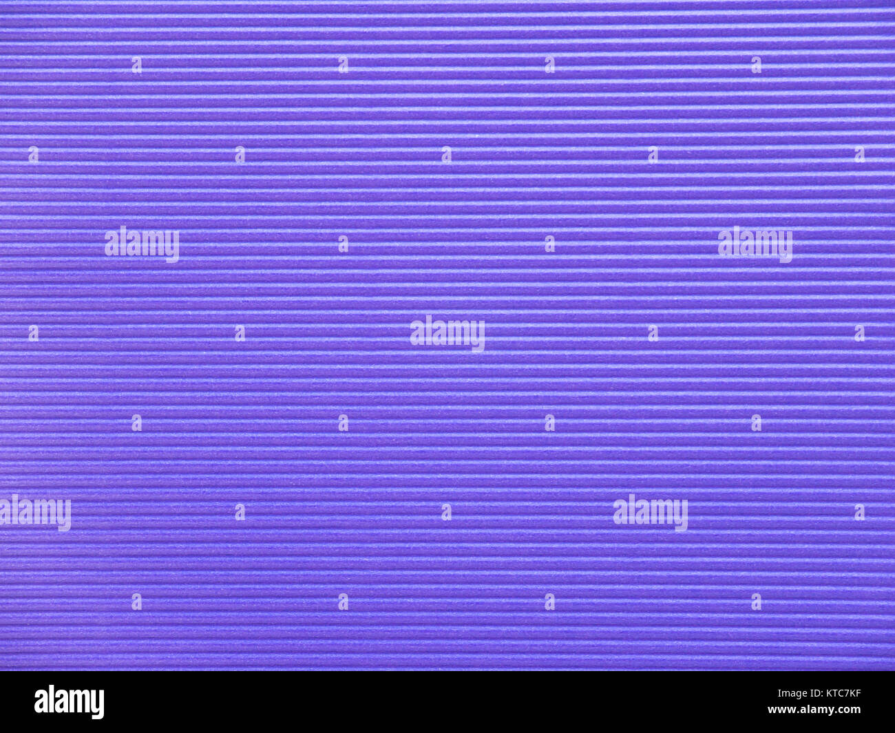 Dark violet corrugated paper texture closeup Stock Photo - Alamy