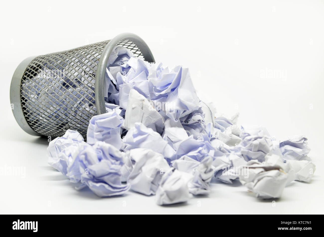 Garbage bin with paper waste Stock Photo - Alamy