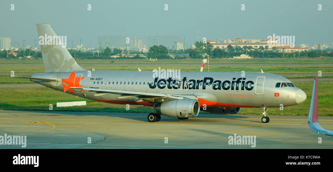 Singapore - Dec 14, 2015. A Jetstar airplane at Changi Airport in ...