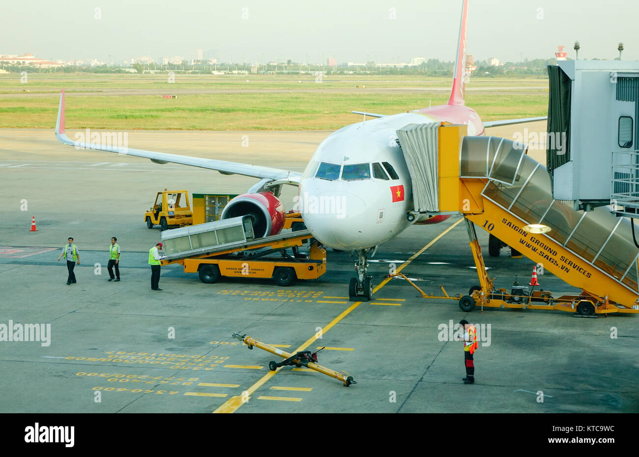 Singapore - Dec 14, 2015. An airplane docking at Changi Airport in ...