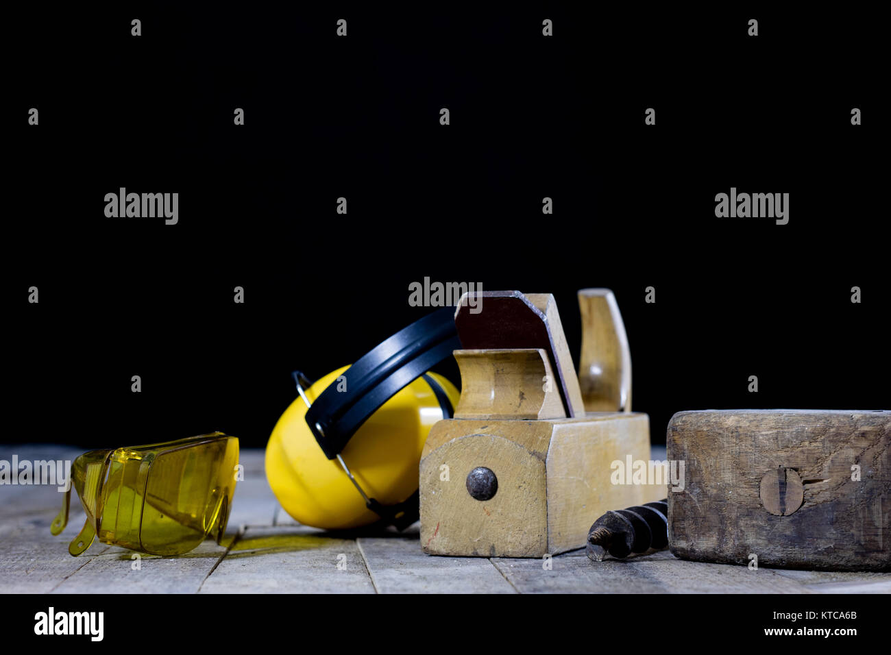 Carpentry is a hobby. Carpentry accessories on a wooden workshop table ...
