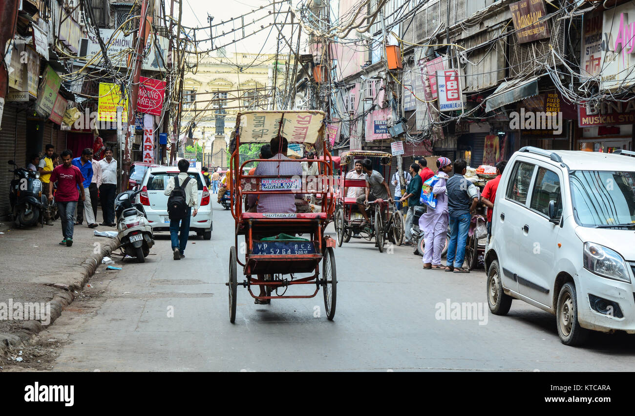 Delhi, India - Jul 26, 2015. Vehicles run on street in Delhi, India ...