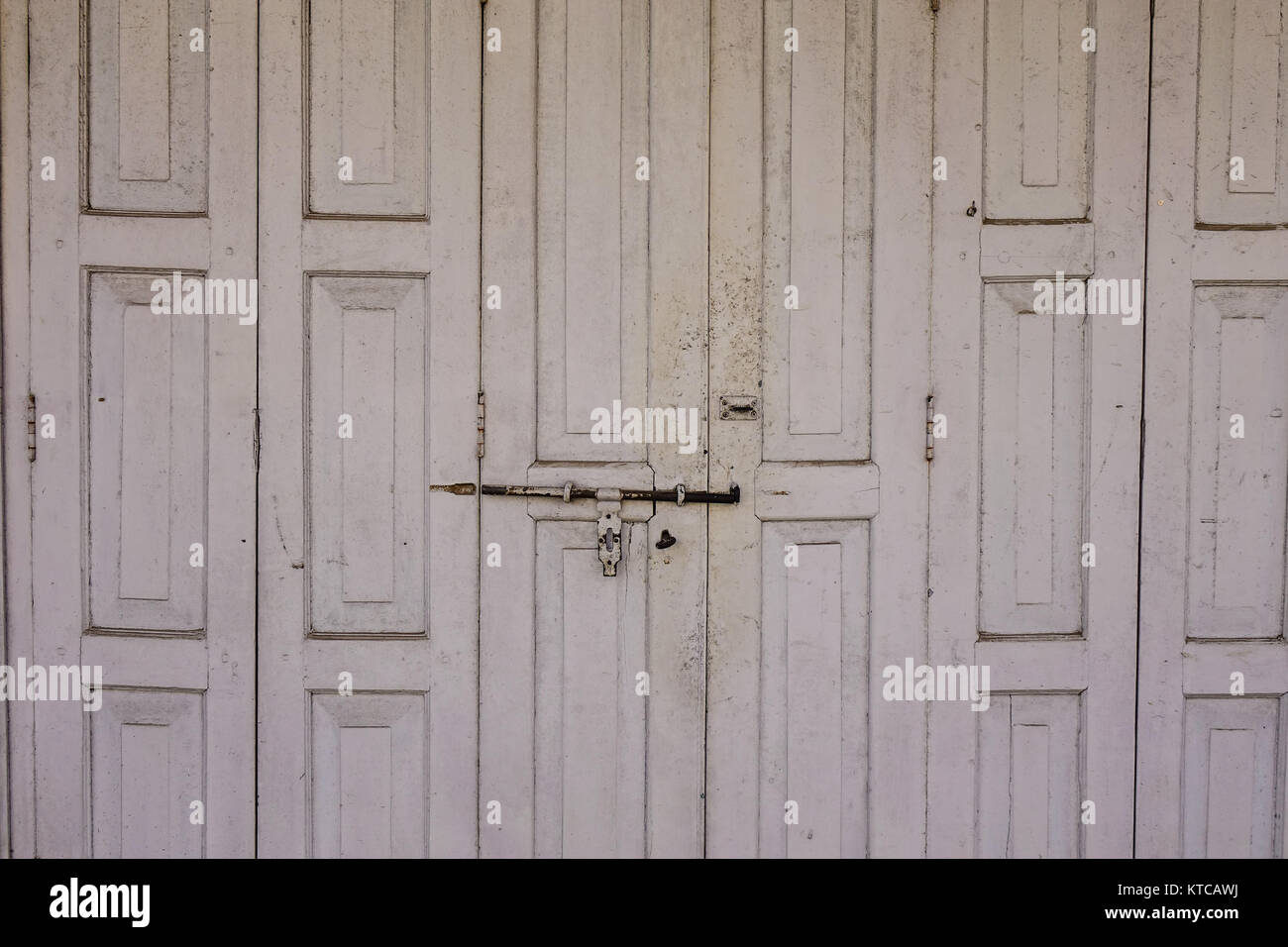 Wooden door with lock at a ancient town in Pyin Oo Lwin, Myanmar Stock ...