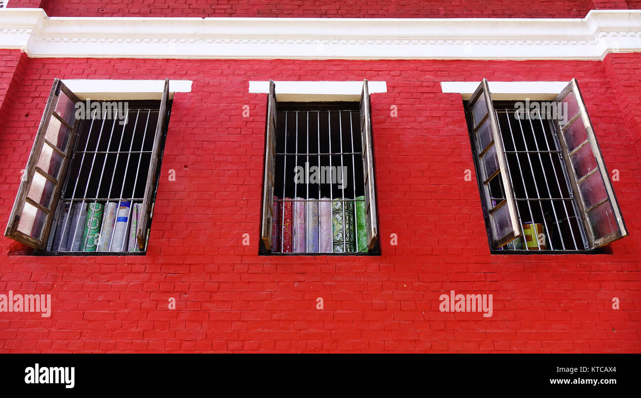 Windows with the wall at a colonial house in Pyin Oo Lwin, Myanmar. The ...