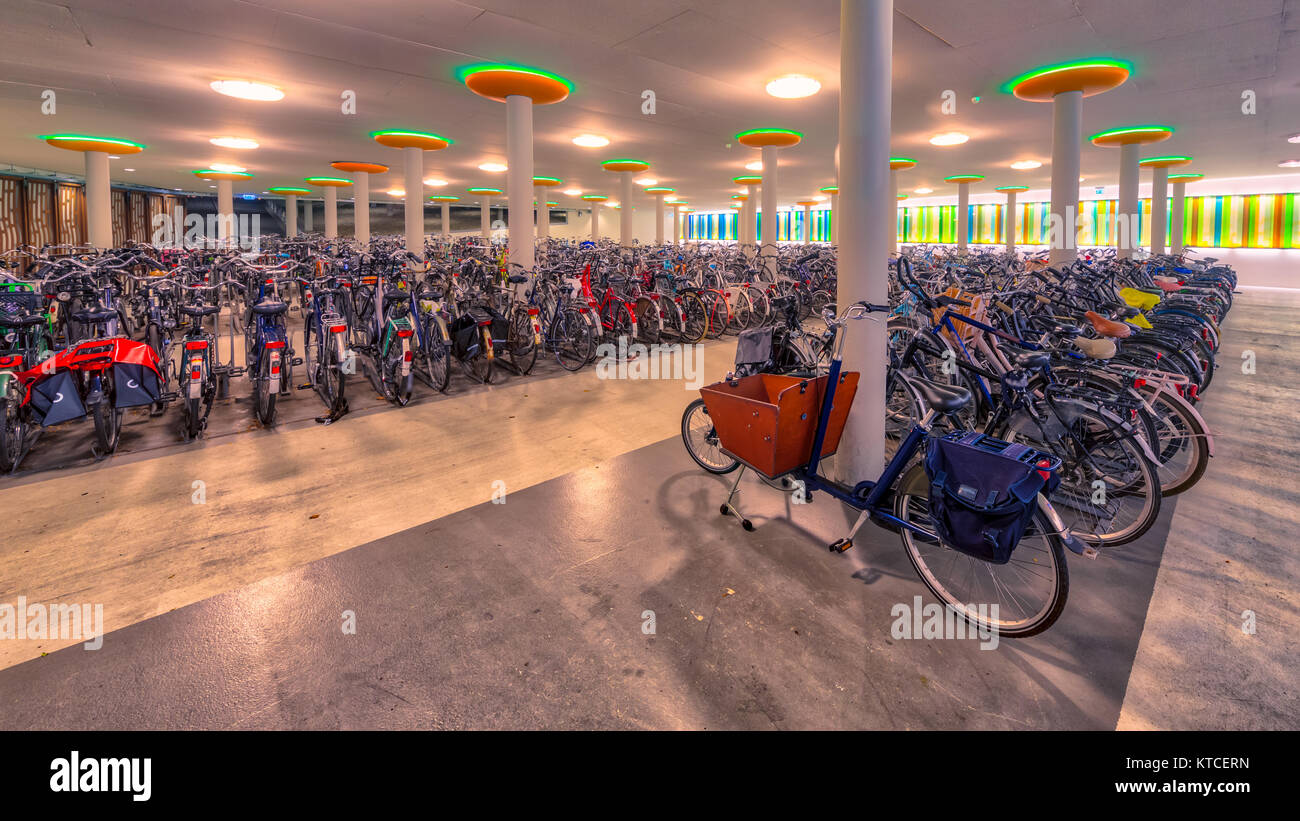 Modern underground indoor bicycle parking at a train station in the ...