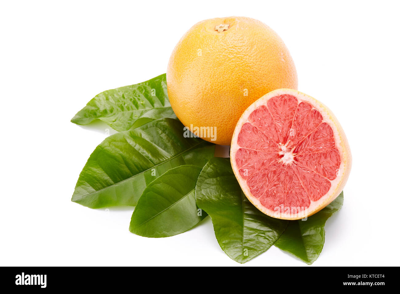Ripe grapefruit on a white background Stock Photo - Alamy