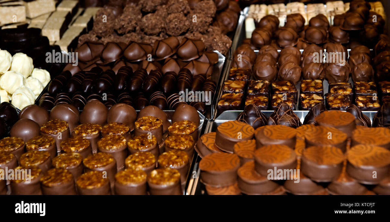 Chocolates in display window Stock Photo - Alamy